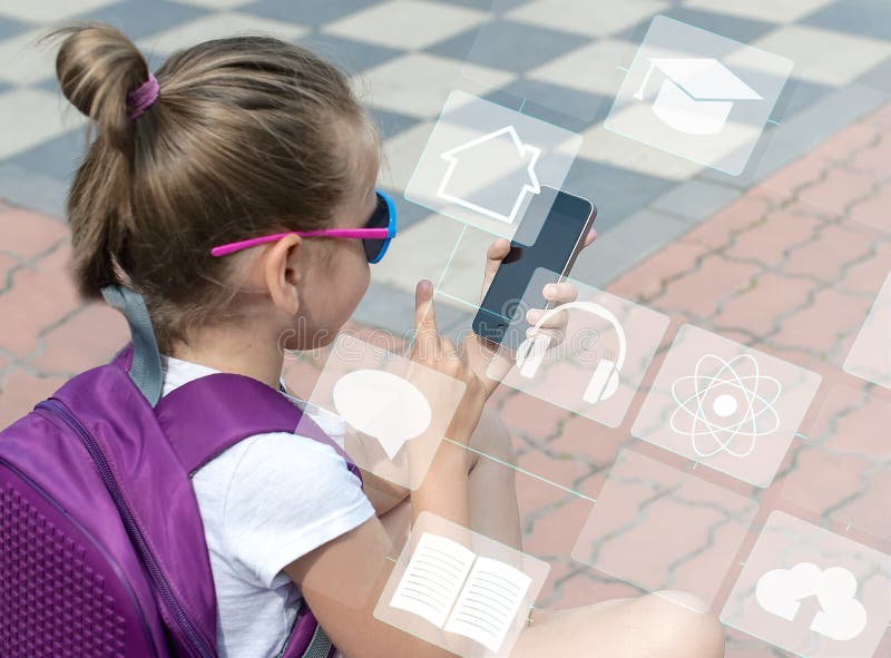 School Child Holding a Mobile Smartphone. Kid Studying Online. Touch ...