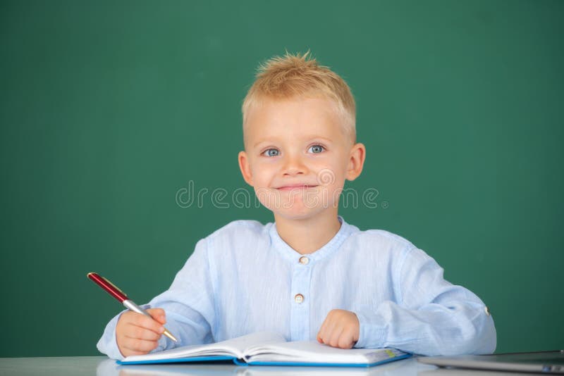 School Child Student Learn Lesson Sitting at Desk Studying. Kid Writing ...