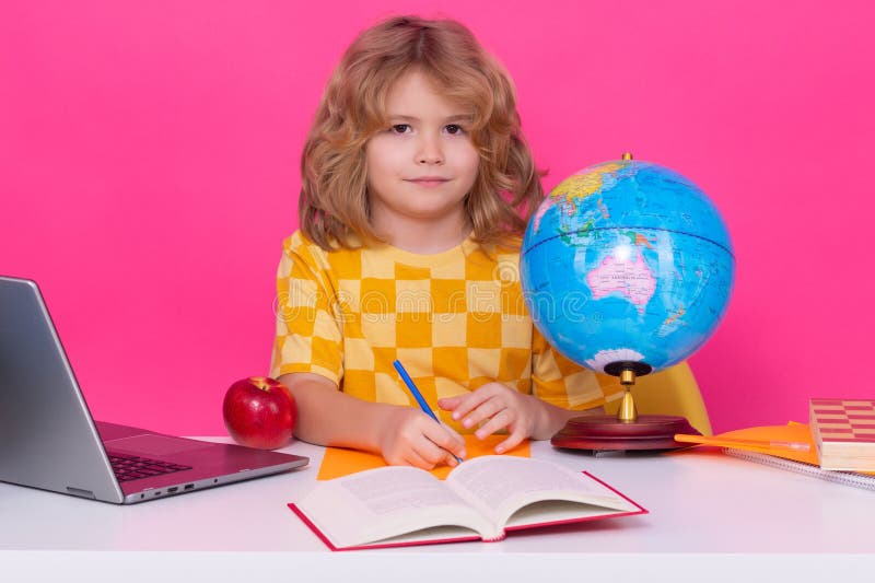 School Child Student Learning in Classlooking at Globe during Geography ...