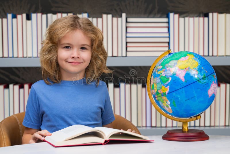 School Child Studying in Classroom at Elementary School. Kid Studying ...