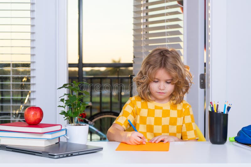 School Child Studying Writing School Homework at Home. Kid from ...