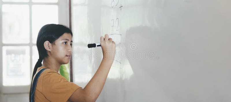 School Child Thinking while Doing Mathematics Problem Stock Photo ...