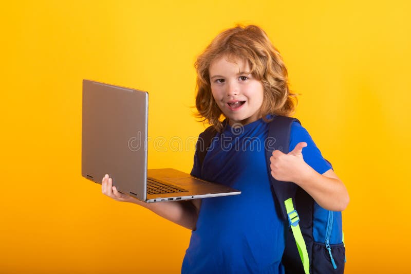 School Child Using Laptop Computer. Kid Boy from Elementary School with ...