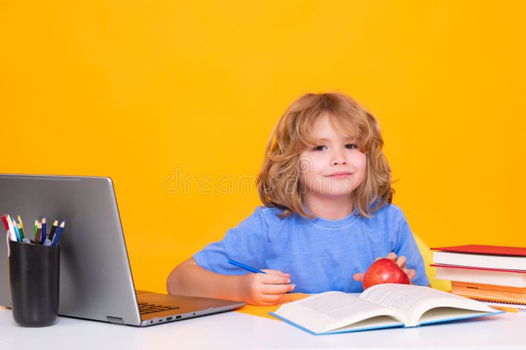 School Child Using Laptop Computer. Nerd School Kid Isolated on Studio ...