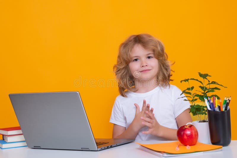 School Child Using Laptop Computer. Nerd School Kid Isolated on Studio ...