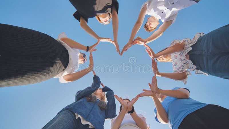 School Children Make a Heart Shape from Their Hands. Stock Photo ...