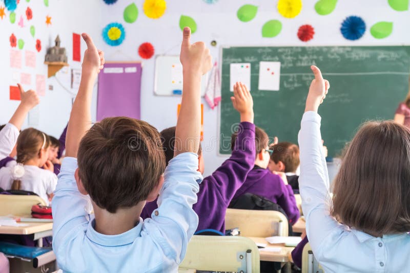 Beautiful Children Are Students Together In A Classroom In School Get ...