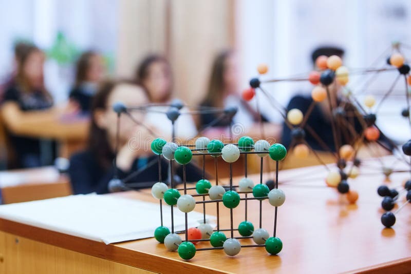 School Children in a Science Class with a Molecular Model. Background ...