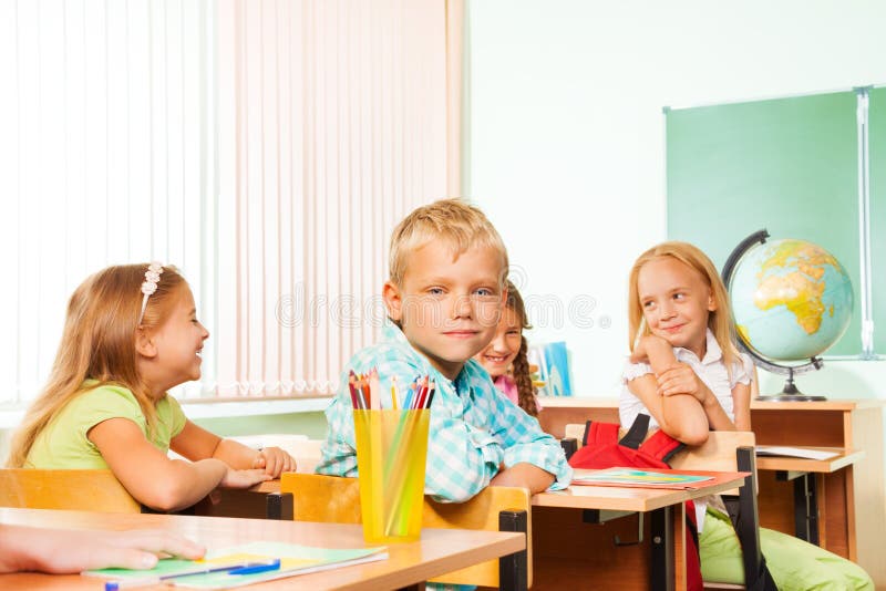 School Children Sitting at Tables during Geography Stock Photo - Image ...