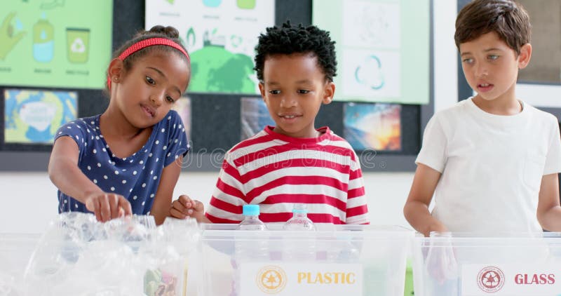 In School, Children Sorting Plastic Bottles into Recycling Bins ...