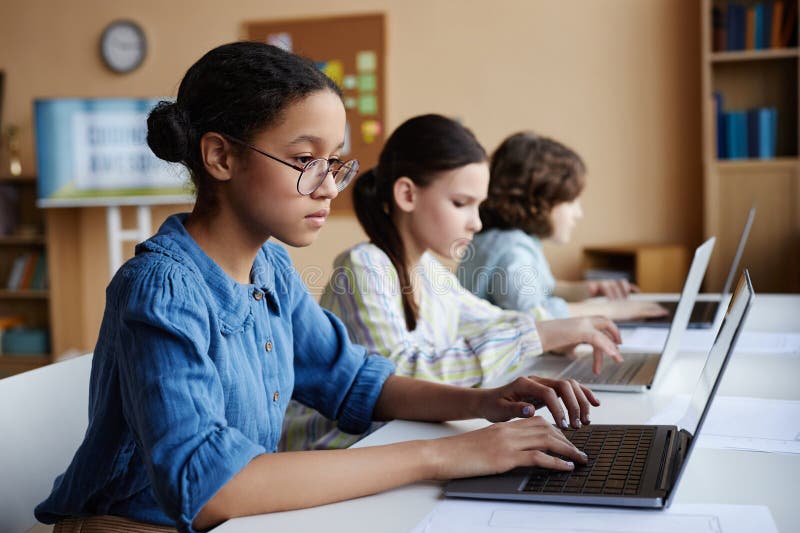 School Children Studying with Computers in Class Stock Photo - Image of ...