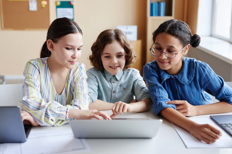 School Children Using Laptop during Lesson Stock Photo - Image of ...