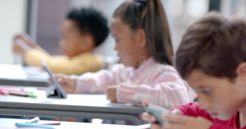 In School, Children Using Tablets and Smartphones in Classroom ...