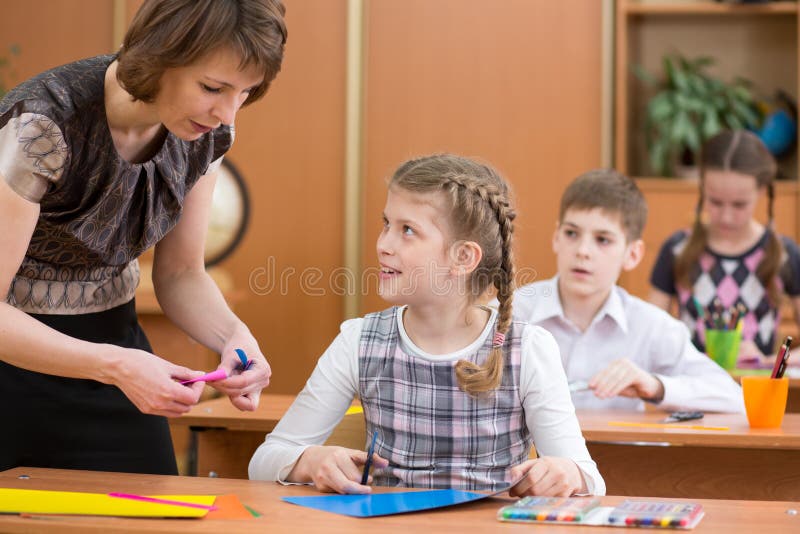 Teacher Working with Children in Preschool Classroom Stock Image ...