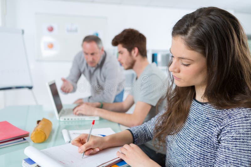 School Class with Student and Teacher Stock Photo - Image of studying ...