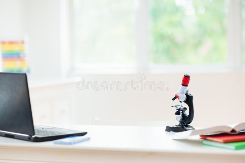 School Desk with Microscope. Science Class Stock Photo - Image of desk ...