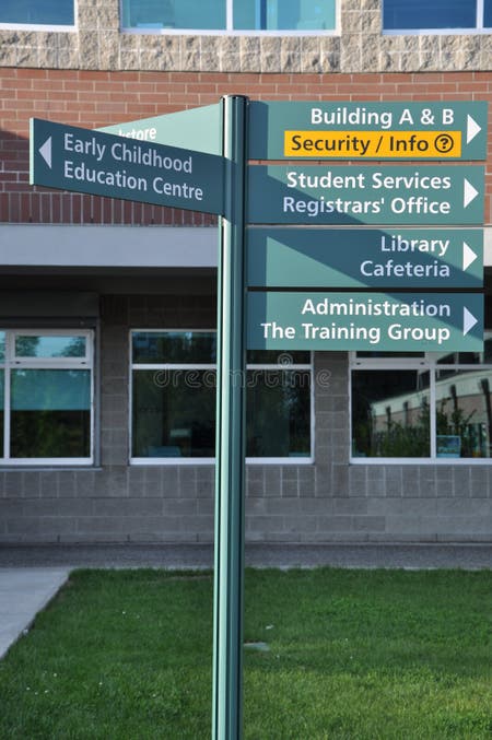 School direction sign stock photo. Image of security - 16252054