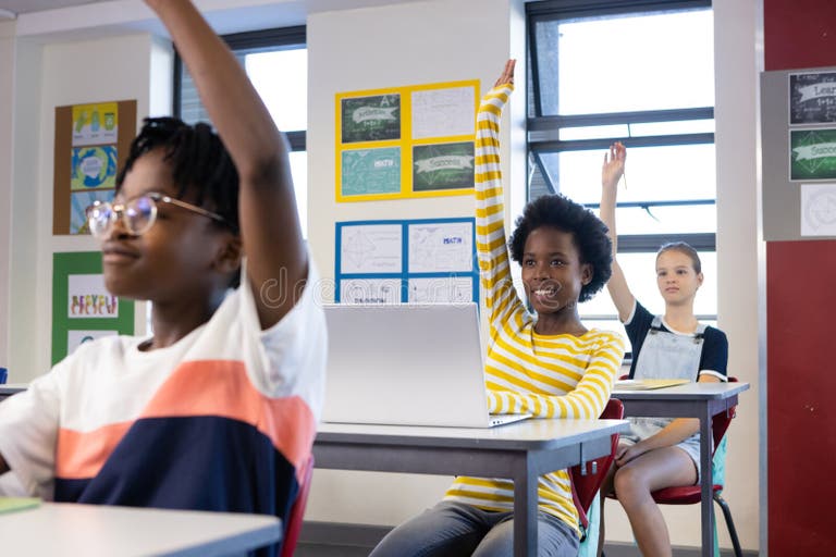 In School, Diverse Students Raising Hands in Classroom, Participating ...