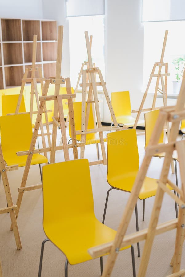 School Drawing Class, Lots of Empty Easels and Yellow Chairs Stock ...