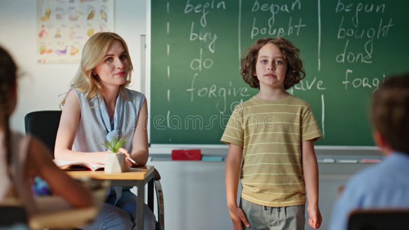 School Educator Asking Boy at Lesson. Cute Schoolboy Answering Homework ...