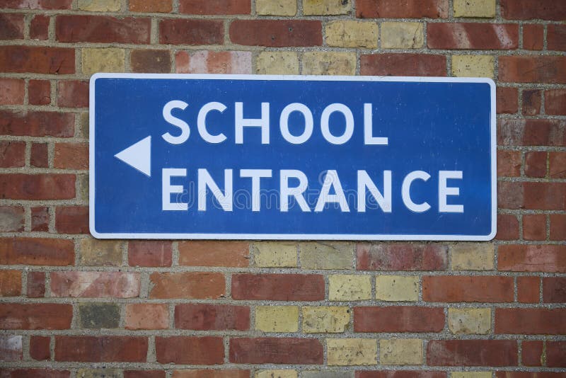 School Entrance with Large Glass Doors and View of Trees and Garden ...