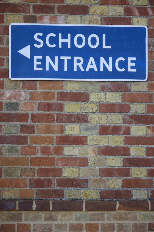 School Entrance Sign on Brick Wall of School Building Stock Image ...