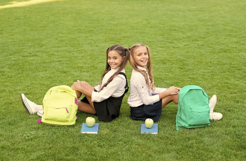 School Friends Relaxing after Classes at School Yard, Good Team Concept ...