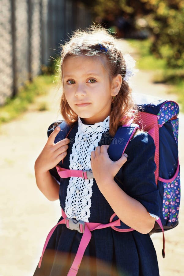 School girl with backpack stock image. Image of childhood - 128279691