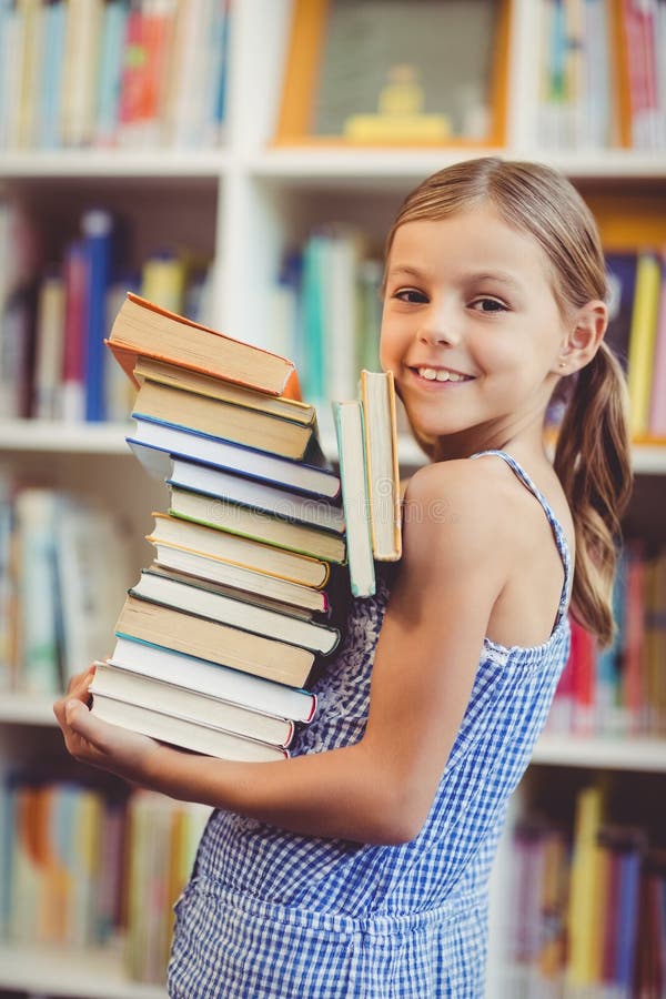 School Girl Reading a Book in Library Stock Image - Image of lifestyle ...