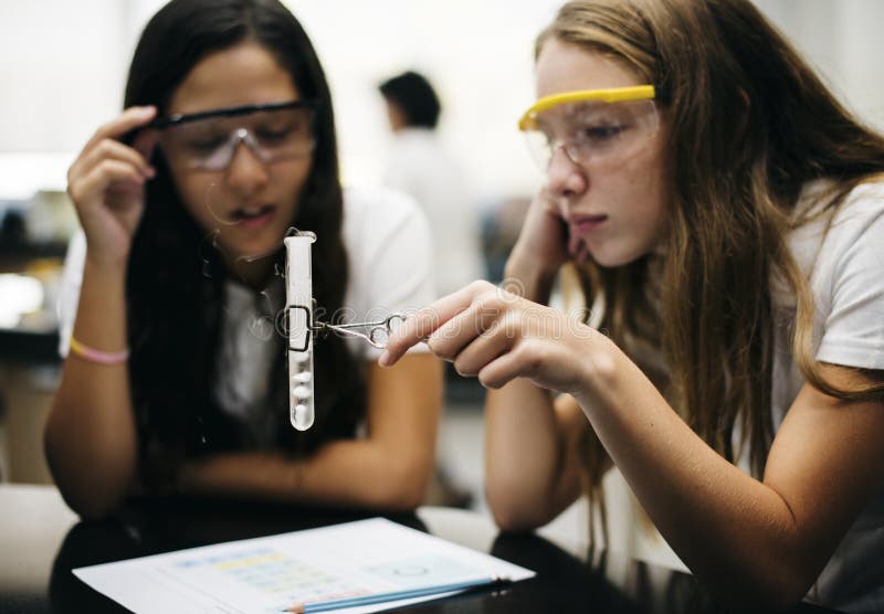 School Girl Friends Learning Science in the Lab Classroom Stock Photo ...
