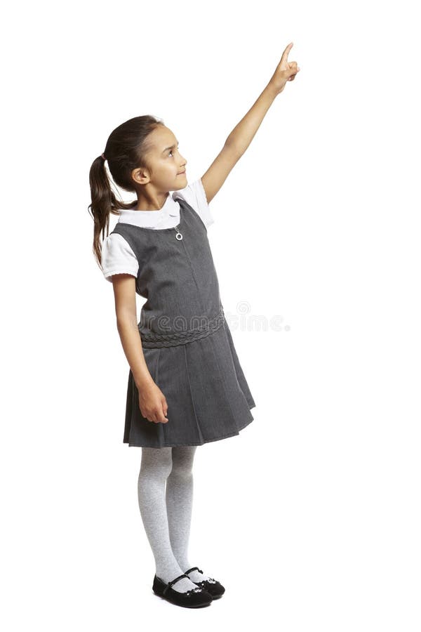 School Girl Pointing Up Smiling Stock Photo - Image of girls, mixed ...