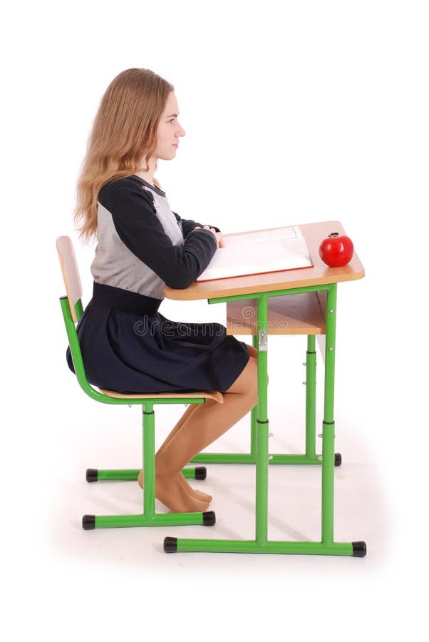 School Girl Sitting at a Desk Stock Photo - Image of dress, little ...