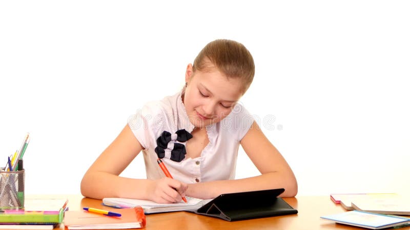 School Girl Sitting, Thinking and Writing Homework Stock Video - Video ...