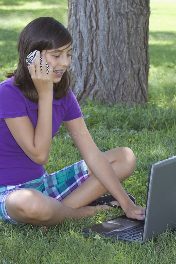 School Girl Using Technology Stock Photo - Image of brown, girl: 11351214