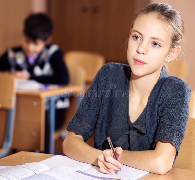 School Girls Sitting at Their Desk Stock Photo - Image of color ...