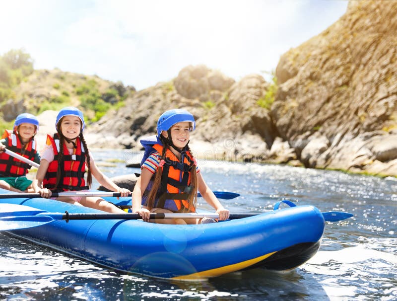 School Holidays. Group of Children Kayaking on River Stock Image ...