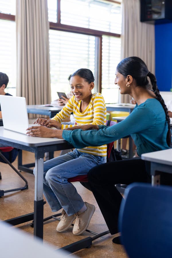 In School, Indian Female Teacher in Lab Coat Pointing at Student in ...