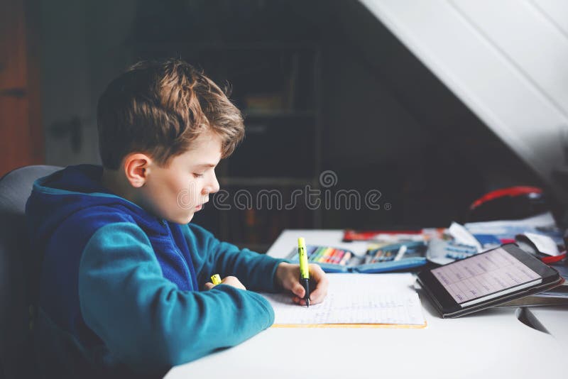 Girl Child Studying at Home Using Digital Tablet Stock Photo - Image of ...