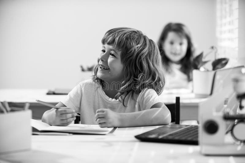 School Kid Doing Homework. Pupil Gets Ready for School. Portrait of ...