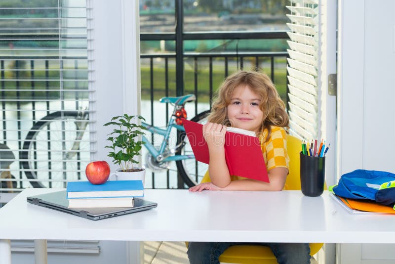 School Kid Reading Book. Nerd School Kid Doing Homework at Home. Clever ...