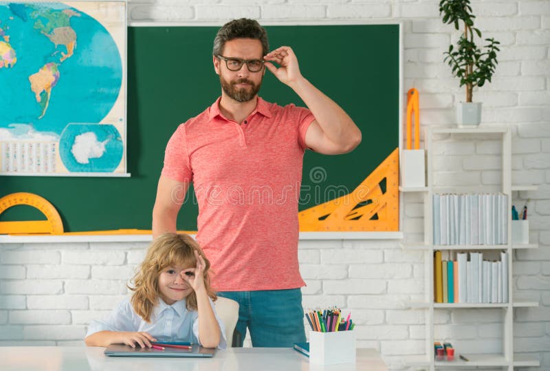 School Kid and Teacher Learning Study in Class. Stock Image - Image of ...