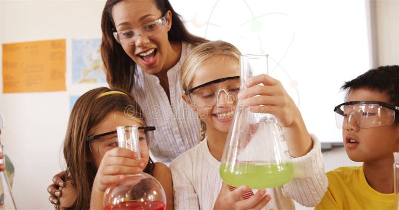School Kids Doing a Chemical Experiment in Laboratory Stock Footage ...