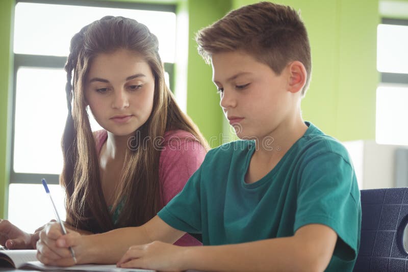 School Kids Doing Homework in Library Stock Photo - Image of learn ...