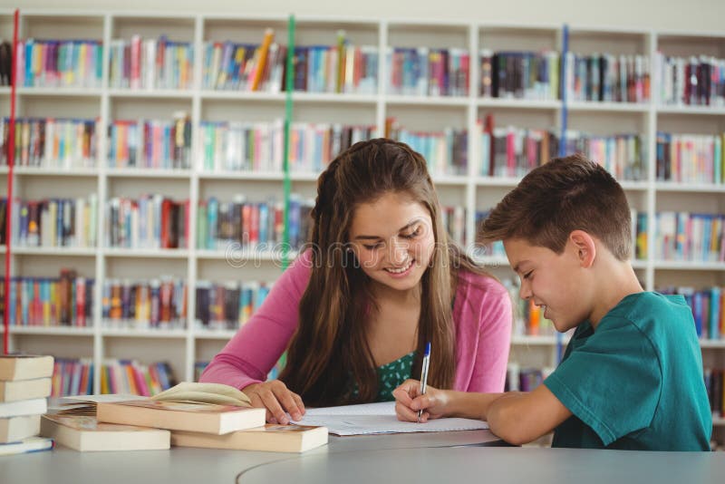 School Kids Doing Homework in Library at School Stock Image - Image of ...