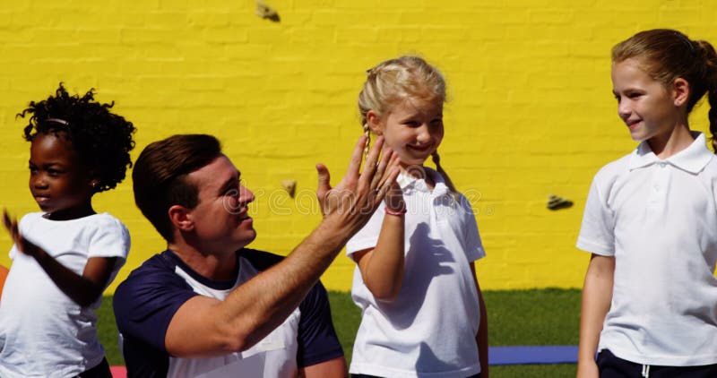 School Kids Giving High Five To Coach Stock Footage - Video of game ...