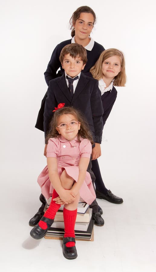 School kids stock photo. Image of four, schoolgirl, sitting - 67202420
