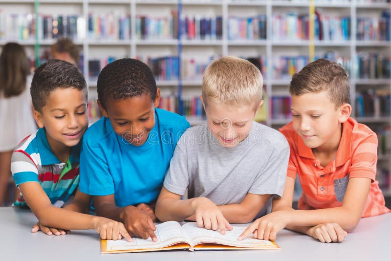 School Kids Reading Book Together in Library Stock Photo - Image of ...
