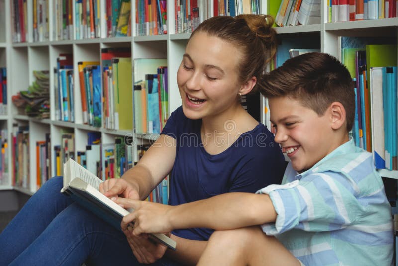 School Kids Reading Books in Library at School Stock Photo - Image of ...
