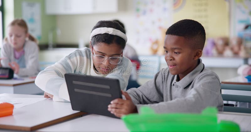 School Kids, Students and Teamwork on Tablet in Classroom Reading with ...