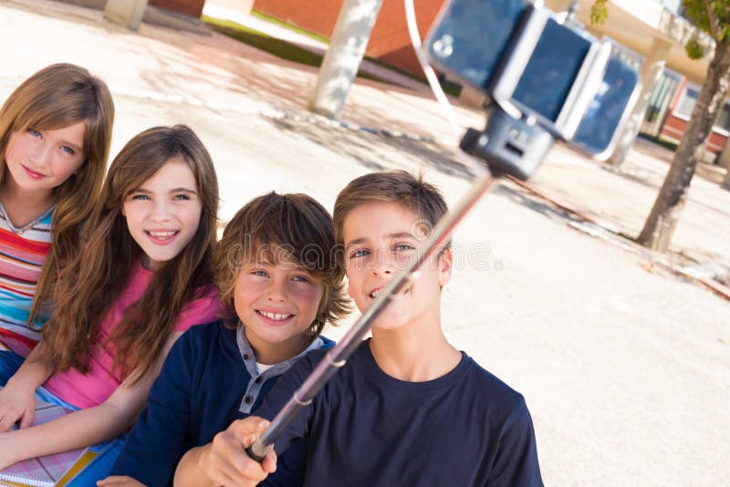 School kids taking selfies stock image. Image of beautiful - 64413763